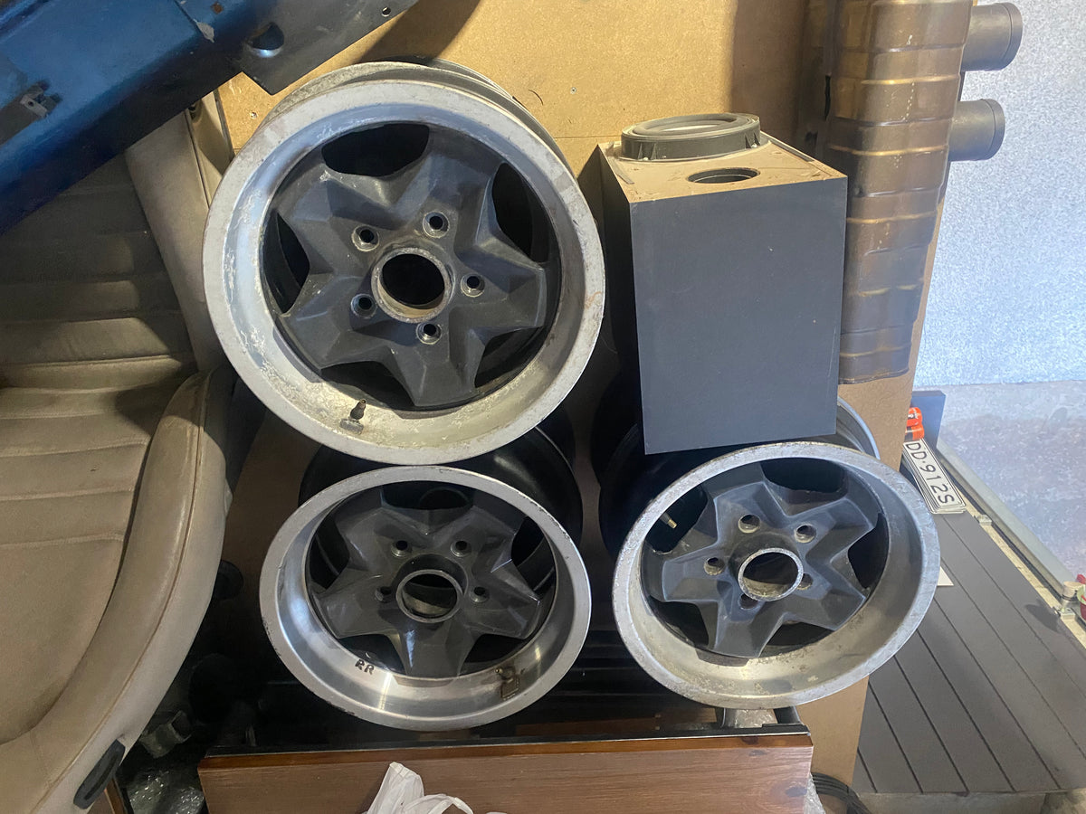 cookie cutter 15 inch wheels with caps – Das Nine Porsche Parts